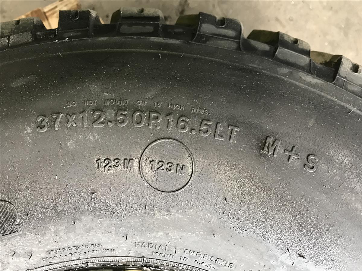 Goodyear Wrangler MT 37X12.5R16.5 LT Tire Mounted on Rim 75% to 90% Tread Life Remaining HMMWV